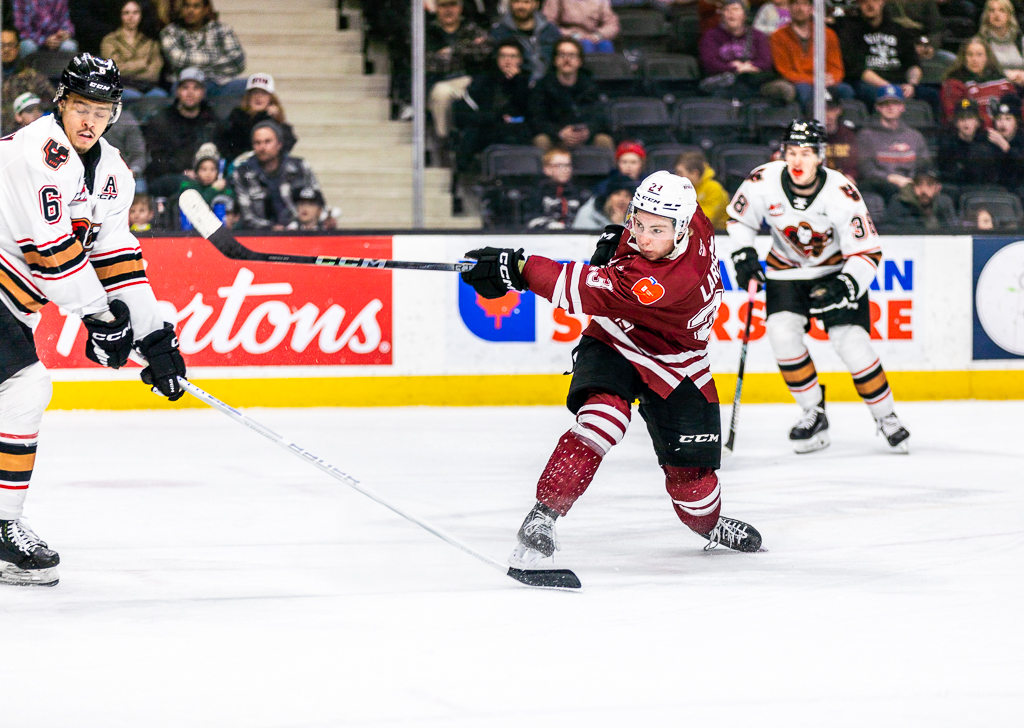 Rebels pull off late win over Hitmen in front of new coach - Red Deer ...